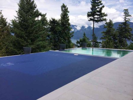 Automatic Pool Covers: Blending in with a vanishing edge pool design ...